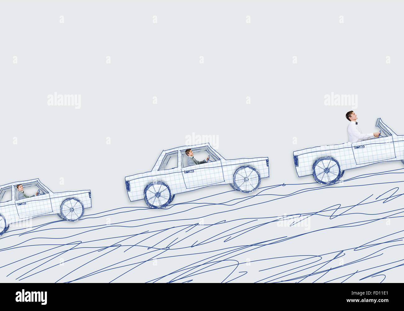 Young man driving car made of sheet of paper Stock Photo - Alamy