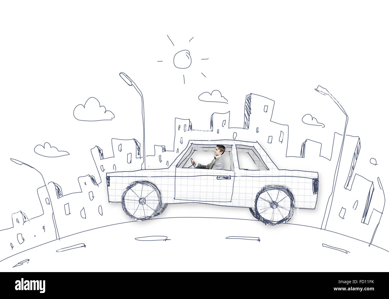 Young man driving car made of sheet of paper Stock Photo - Alamy