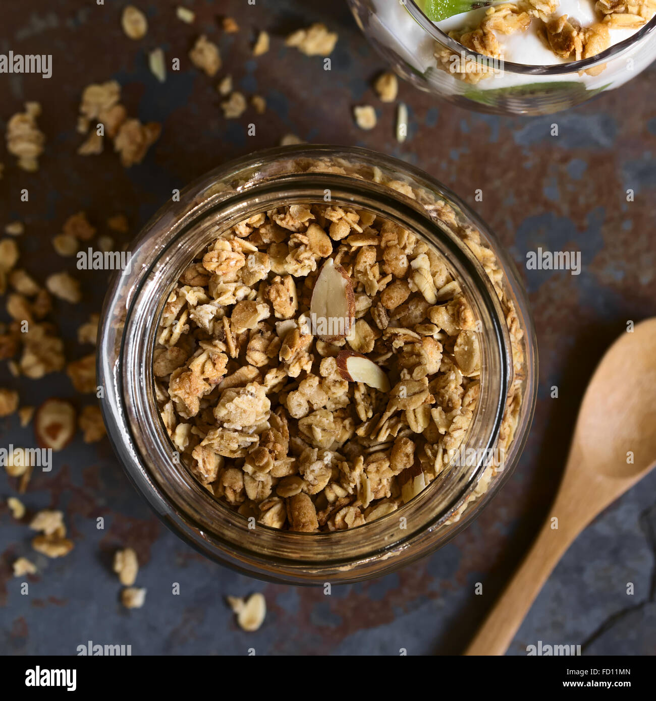 Crunchy almond and oatmeal granola in jar, photographed overhead on ...