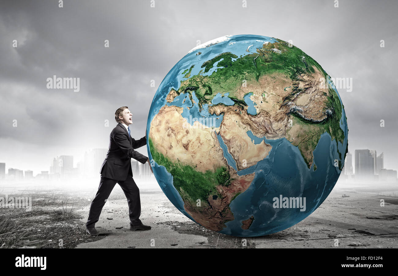 Businessman pushing big Earth planet. Elements of this image are ...