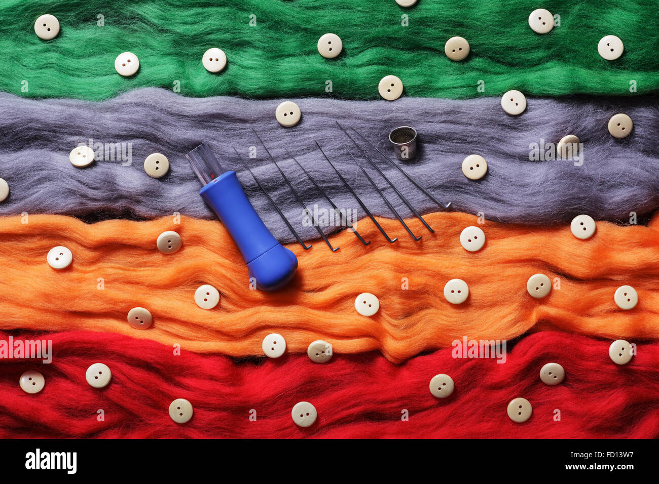 Multi-colored wool for felting and needles- handicraft items Stock ...