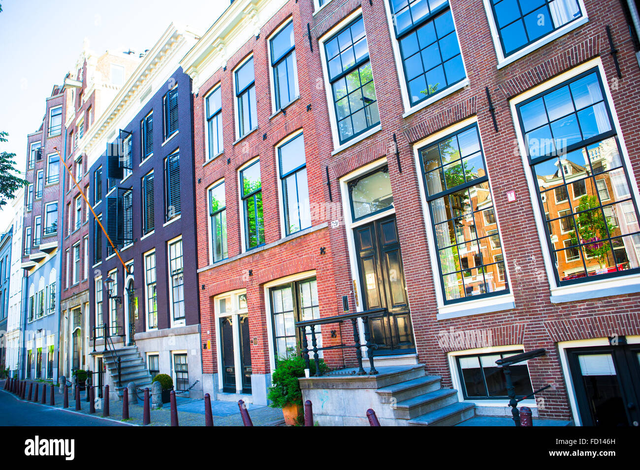 Traditional dutch buildings and blocks of flats in in old Amsterdam ...