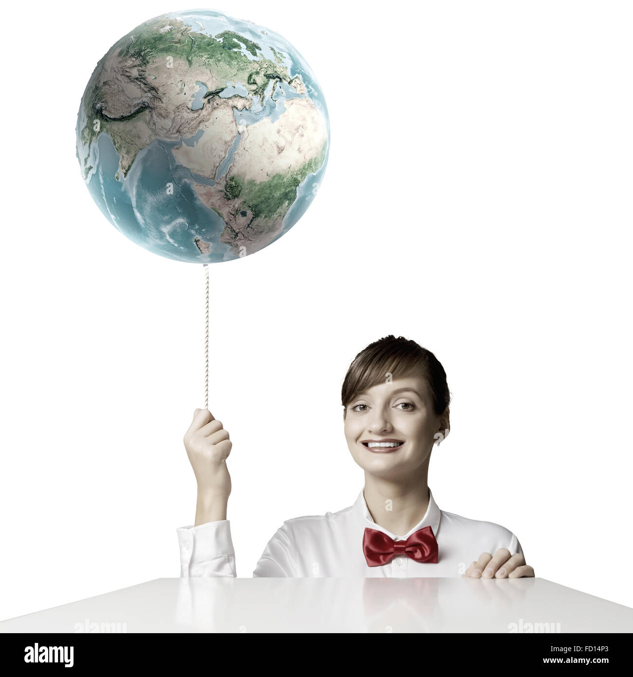 Young smiling woman holding balloon colored like Earth planet. Elements ...