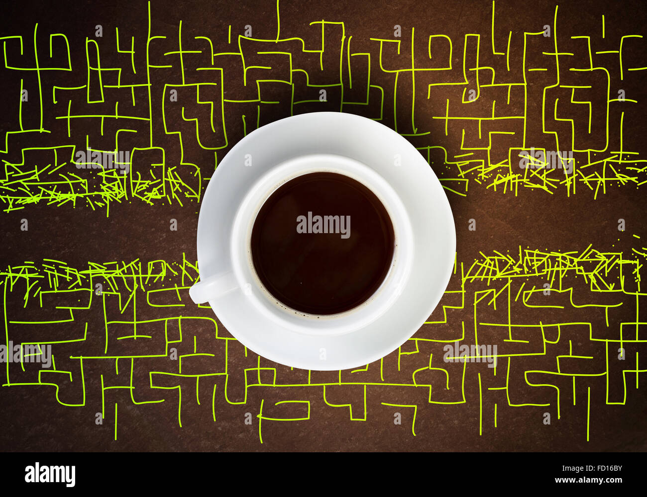 Close up of cup of coffee and labyrinth at background Stock Photo - Alamy