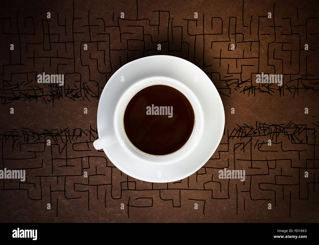 Close up of cup of coffee and labyrinth at background Stock Photo - Alamy
