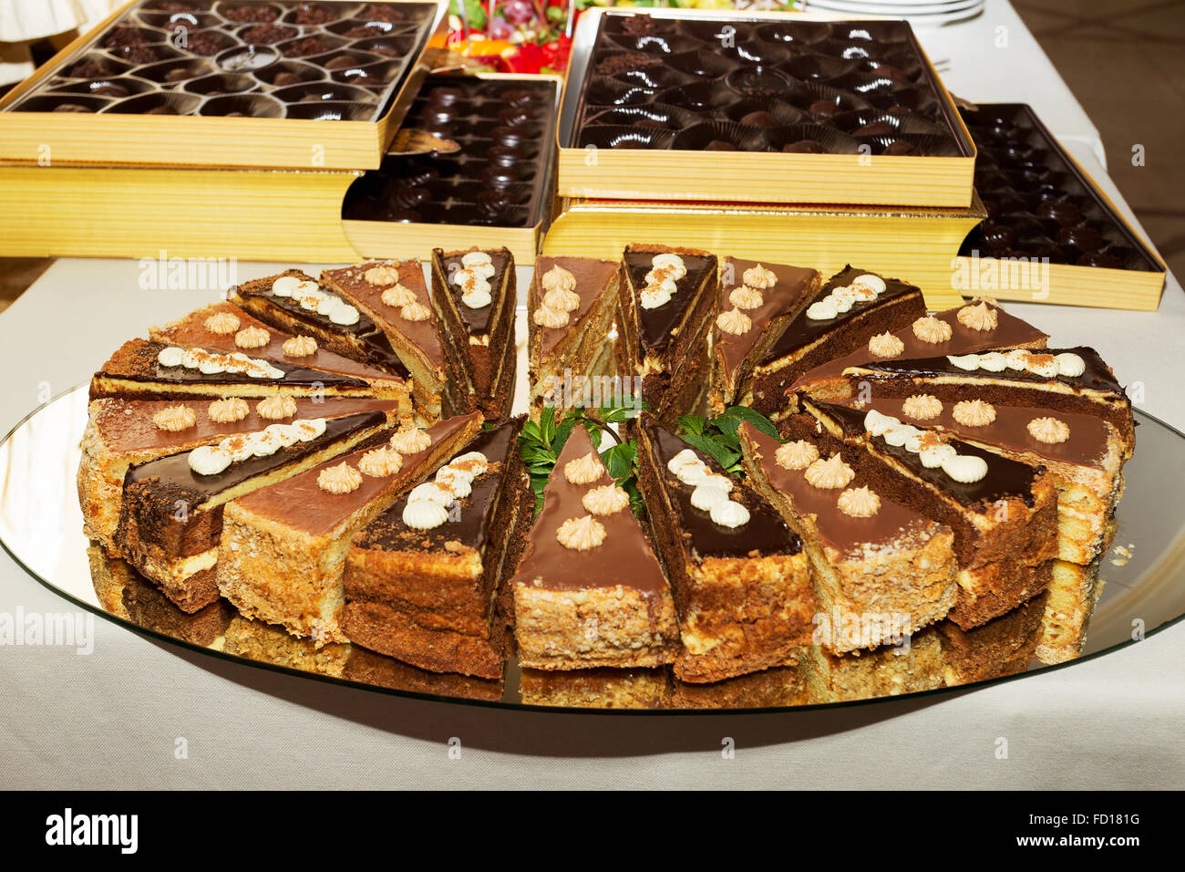 Authentic Shortcake Cake, mint leaves on a plate mirror, buffet ...