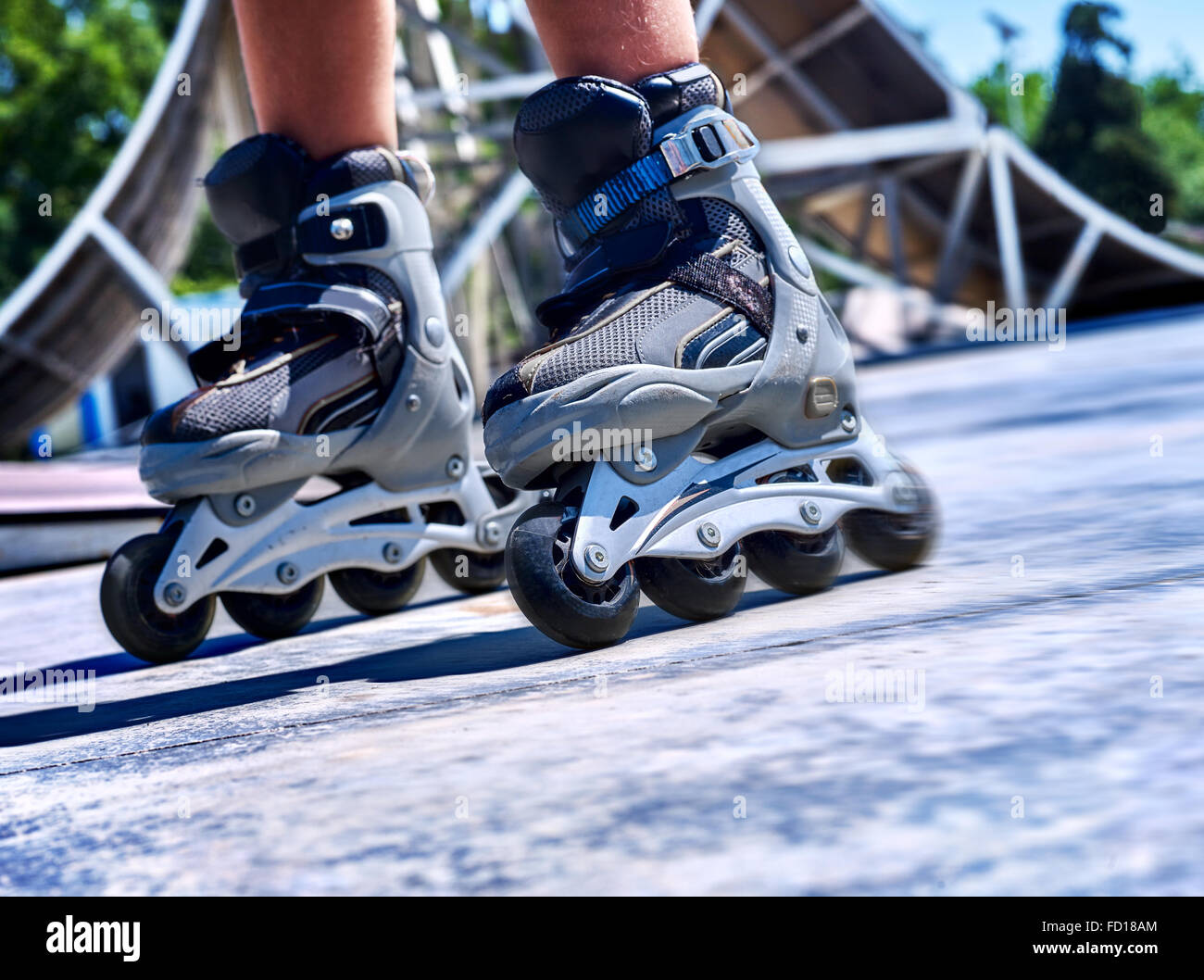 Girl riding on roller skates Stock Photo - Alamy