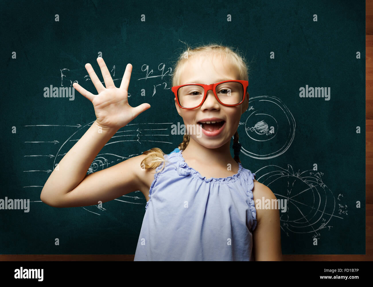 Genius girl in red glasses near blackboard with formulas Stock Photo ...