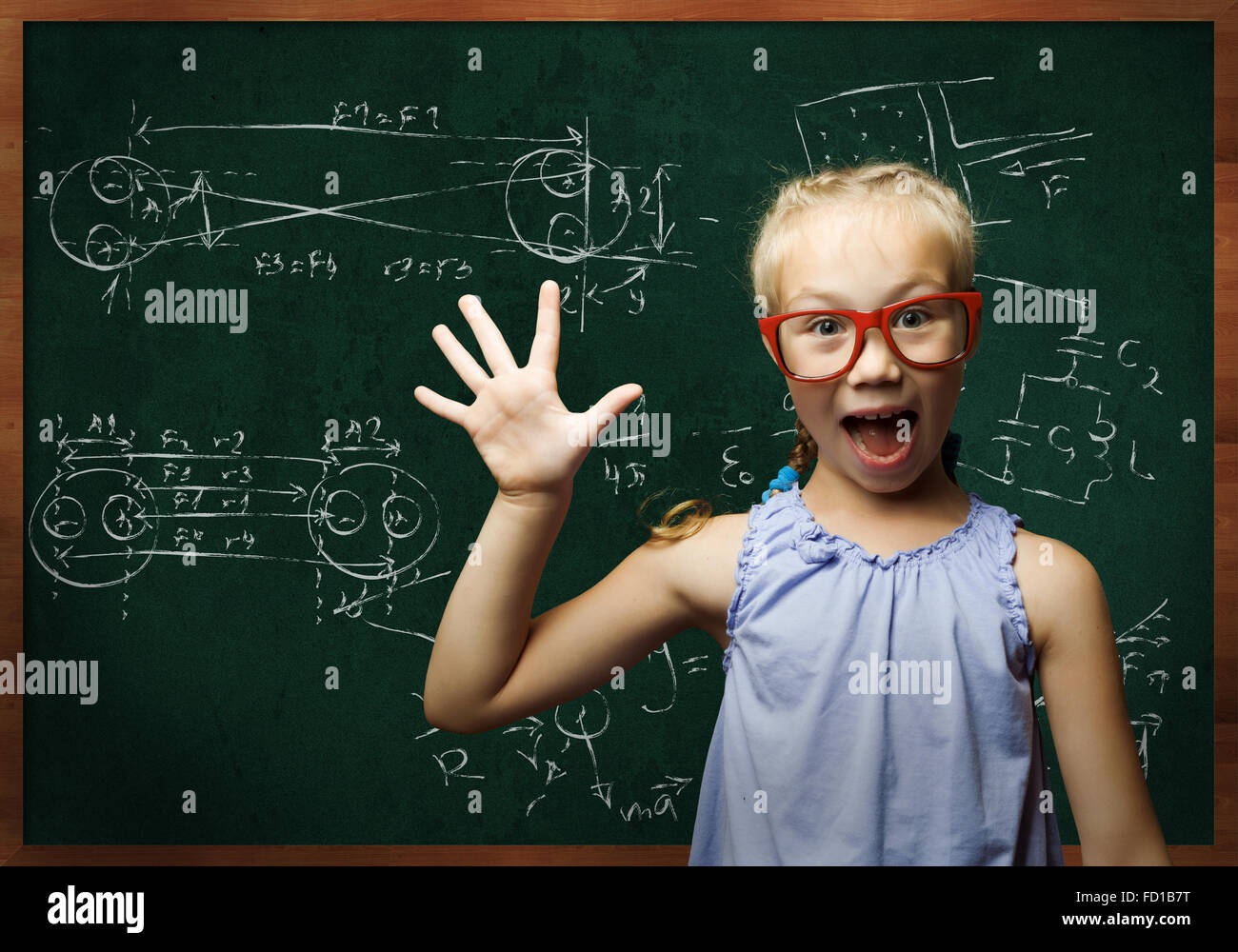 Genius girl in red glasses near blackboard with formulas Stock Photo ...