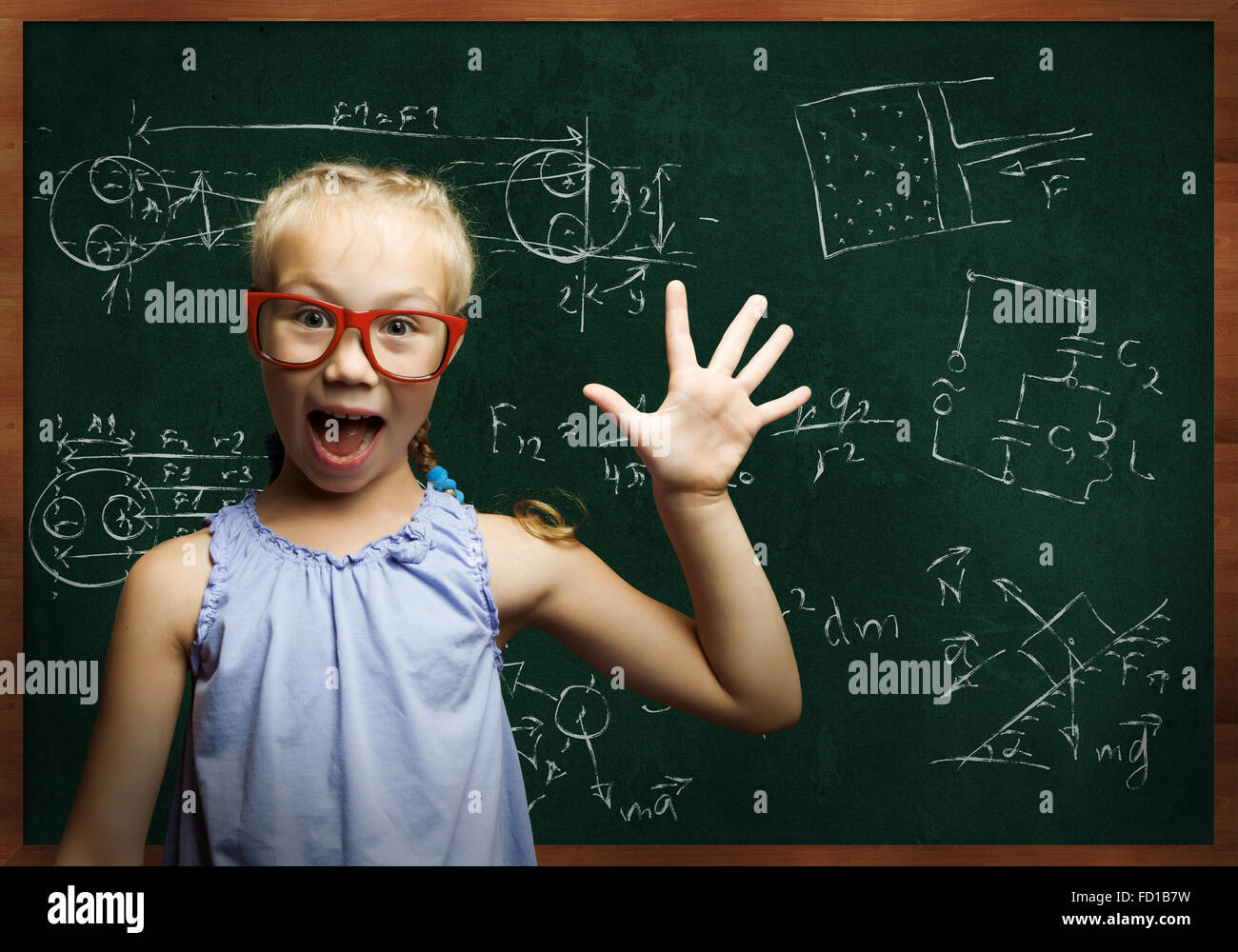 Genius girl in red glasses near blackboard with formulas Stock Photo ...