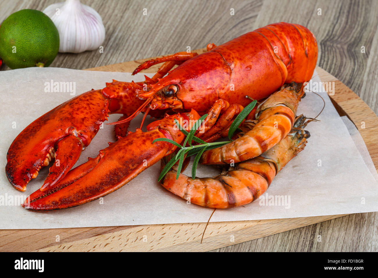 Big cooked lobster and tiger shrimps ready for eating Stock Photo - Alamy