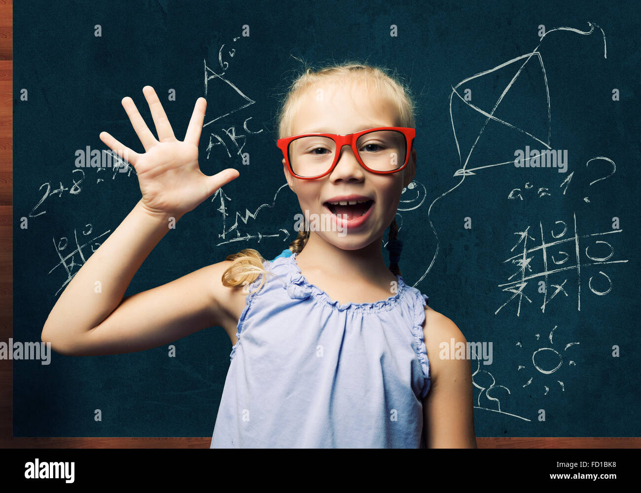 Genius girl in red glasses near blackboard with formulas Stock Photo ...