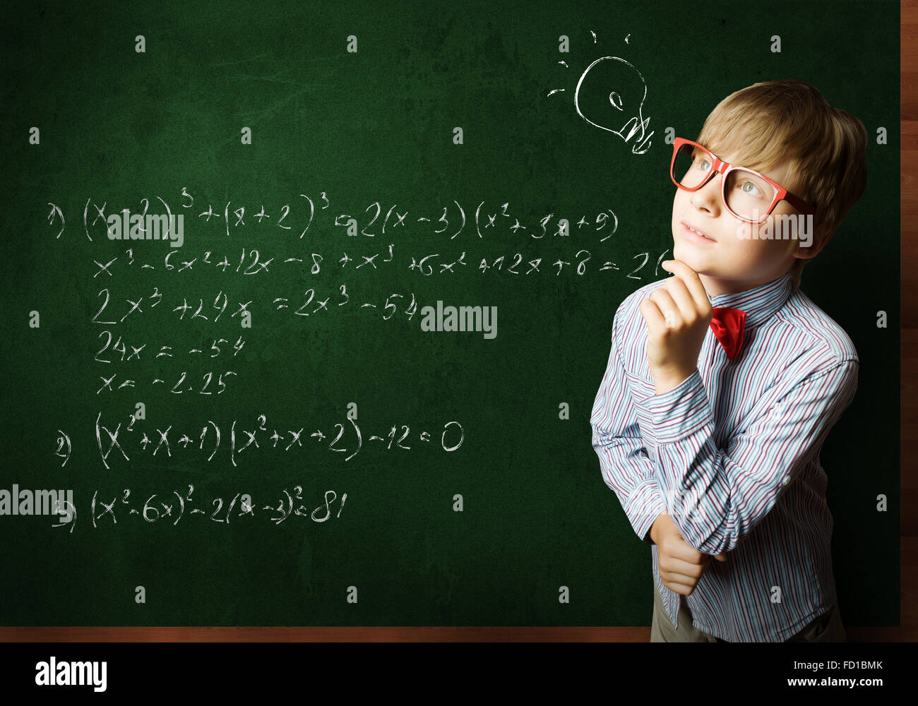 Smart boy in red glasses near blackboard with formulas Stock Photo - Alamy
