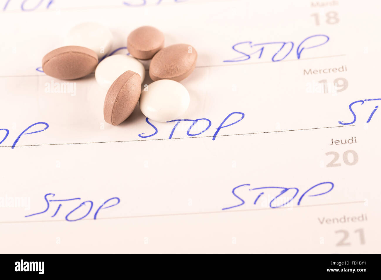 Office workplace with an open diary, written stop, with tablets Stock ...