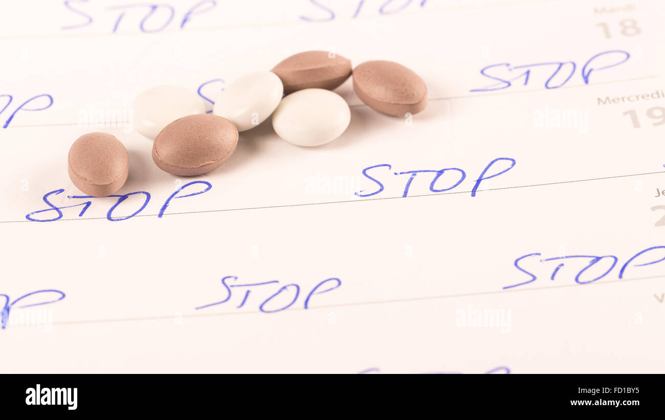 Office workplace with an open diary, written stop, with tablets Stock ...