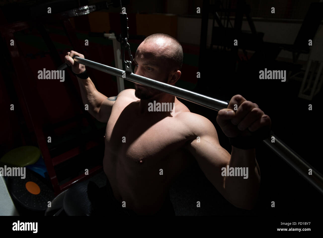 Bodybuilder Doing Back Exercises In The Gym Stock Photo - Alamy