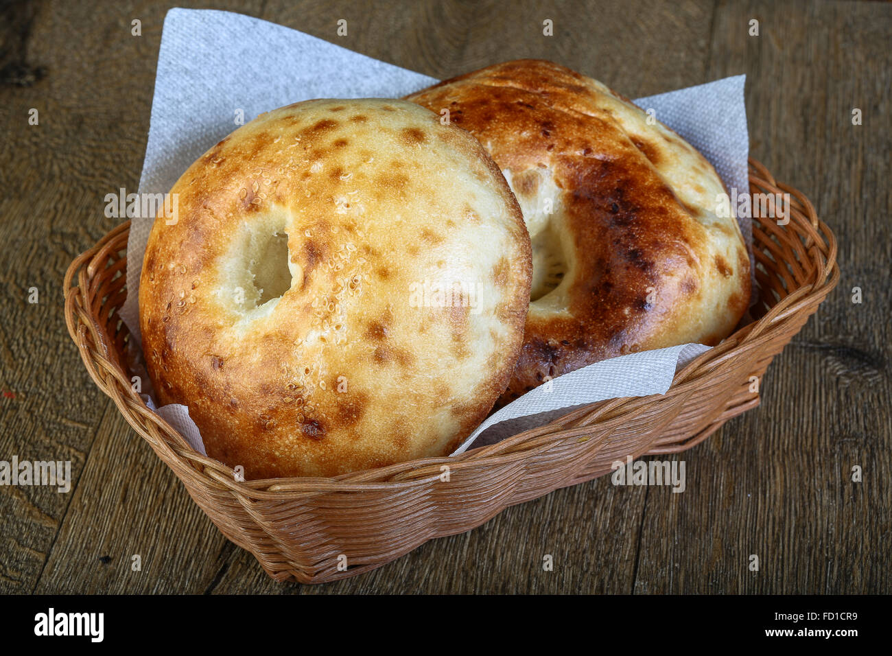 Traditional Uzbek bread on the wood background Stock Photo - Alamy