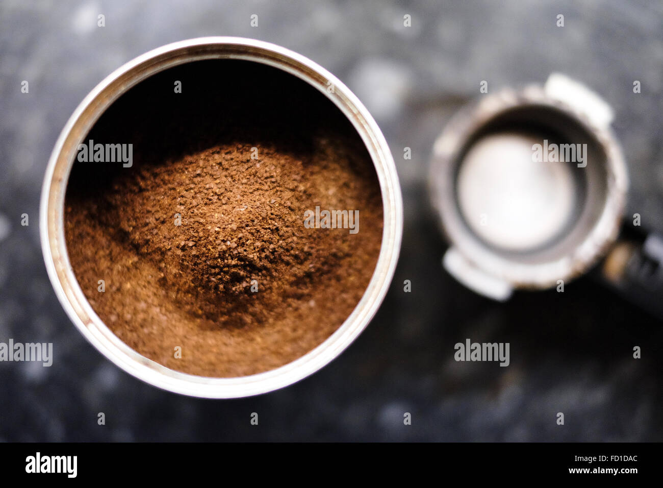 Pot of ground coffee from above with an espresso machine holder Stock ...