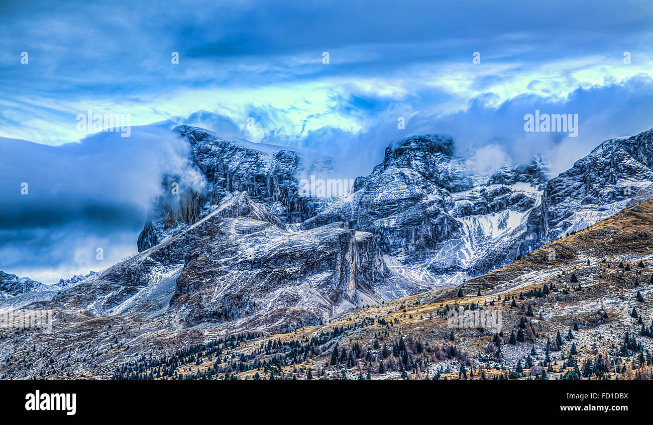 Impressive landscape with clouds gathering on the peaks in Le Dévoluy ...