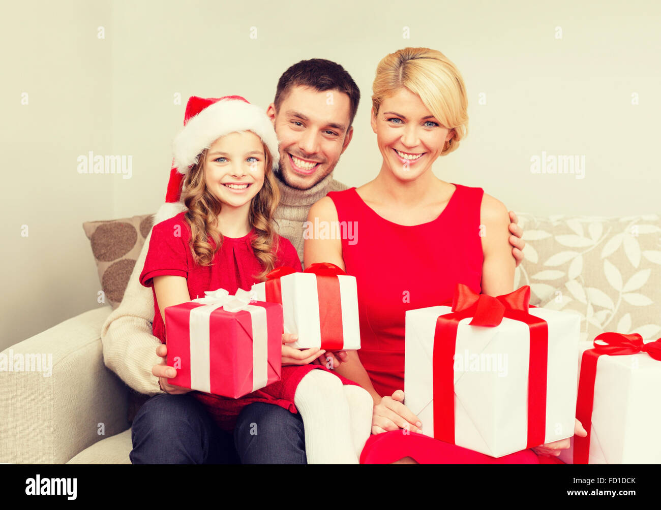smiling family holding many gift boxes Stock Photo - Alamy