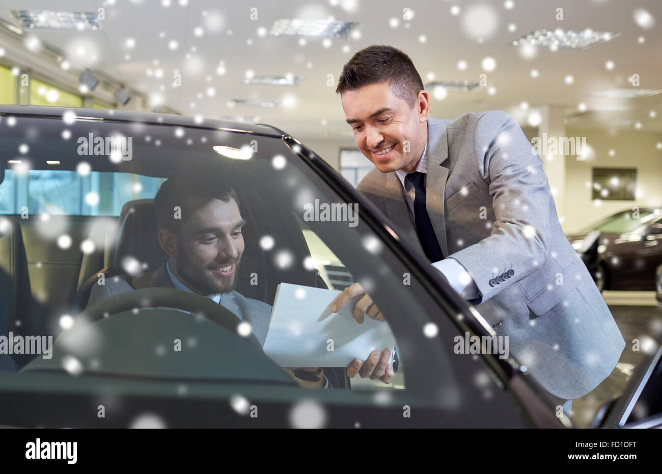 happy man with car dealer in auto show or salon Stock Photo - Alamy