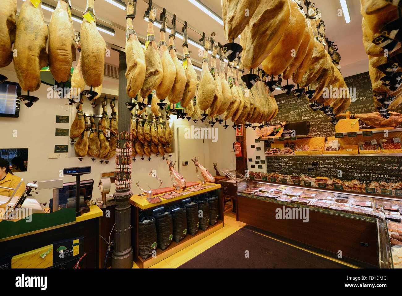 Cured ham hanging in a specialized ham shop in Bilbao, Spain Stock ...