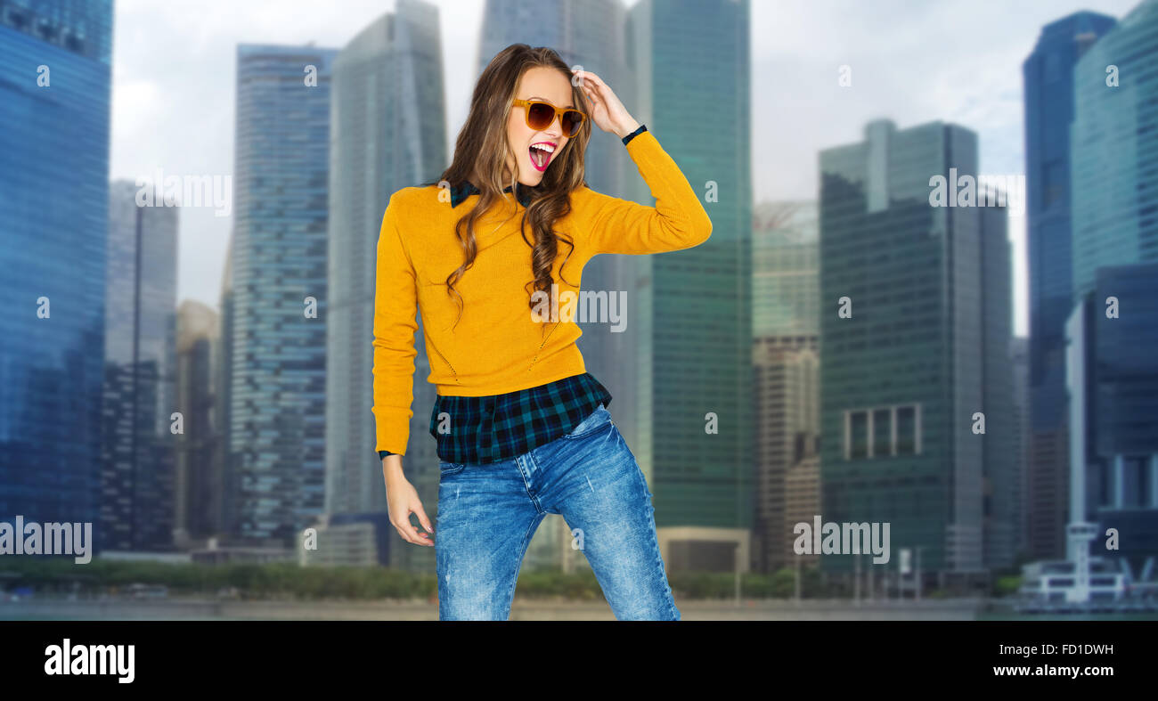 happy young woman or teen girl over city Stock Photo - Alamy