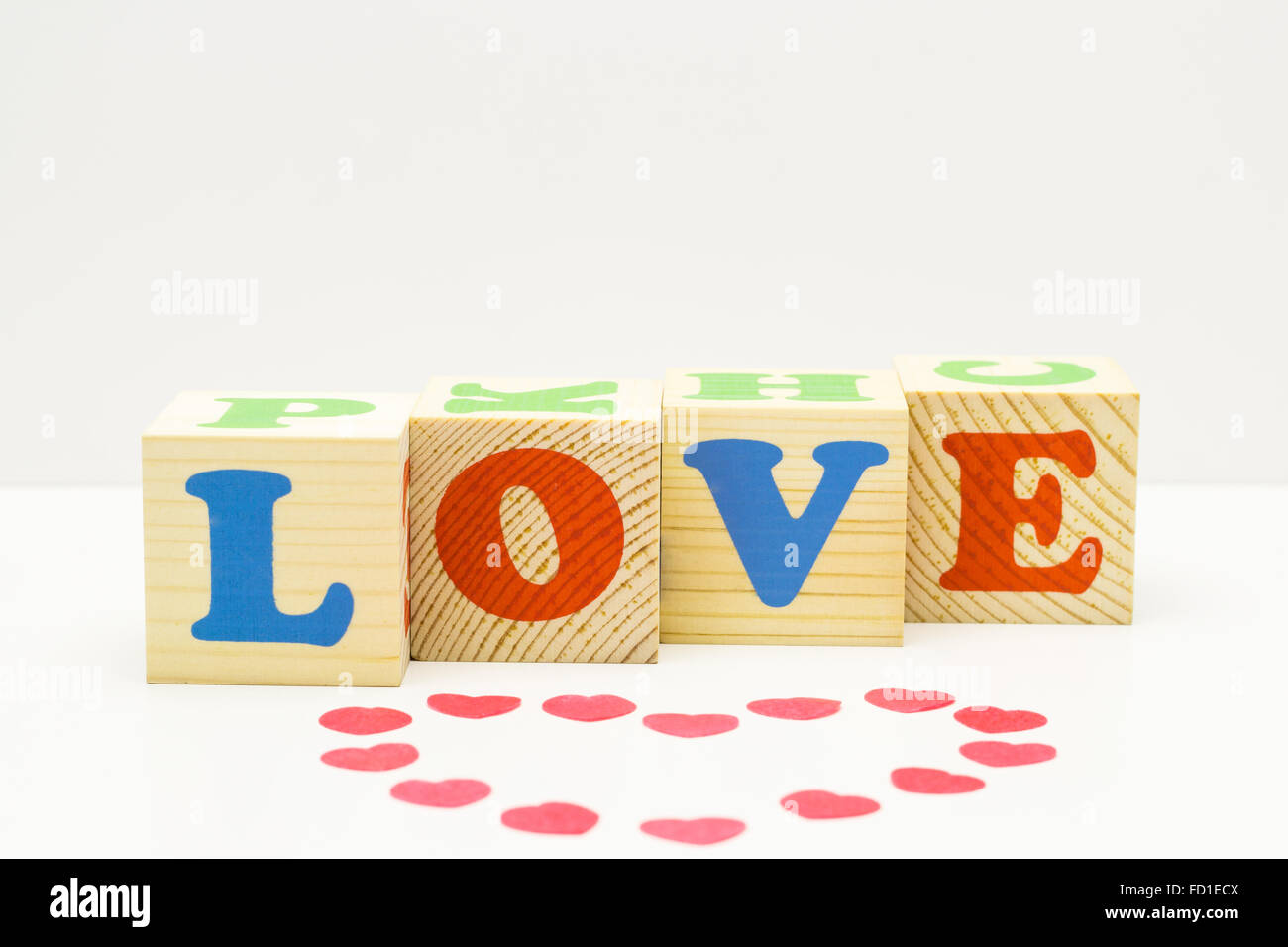 Wood cube with inscription LOVE Stock Photo - Alamy