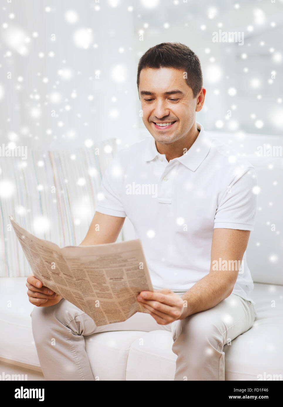 Happy newspaper reading hi-res stock photography and images - Alamy