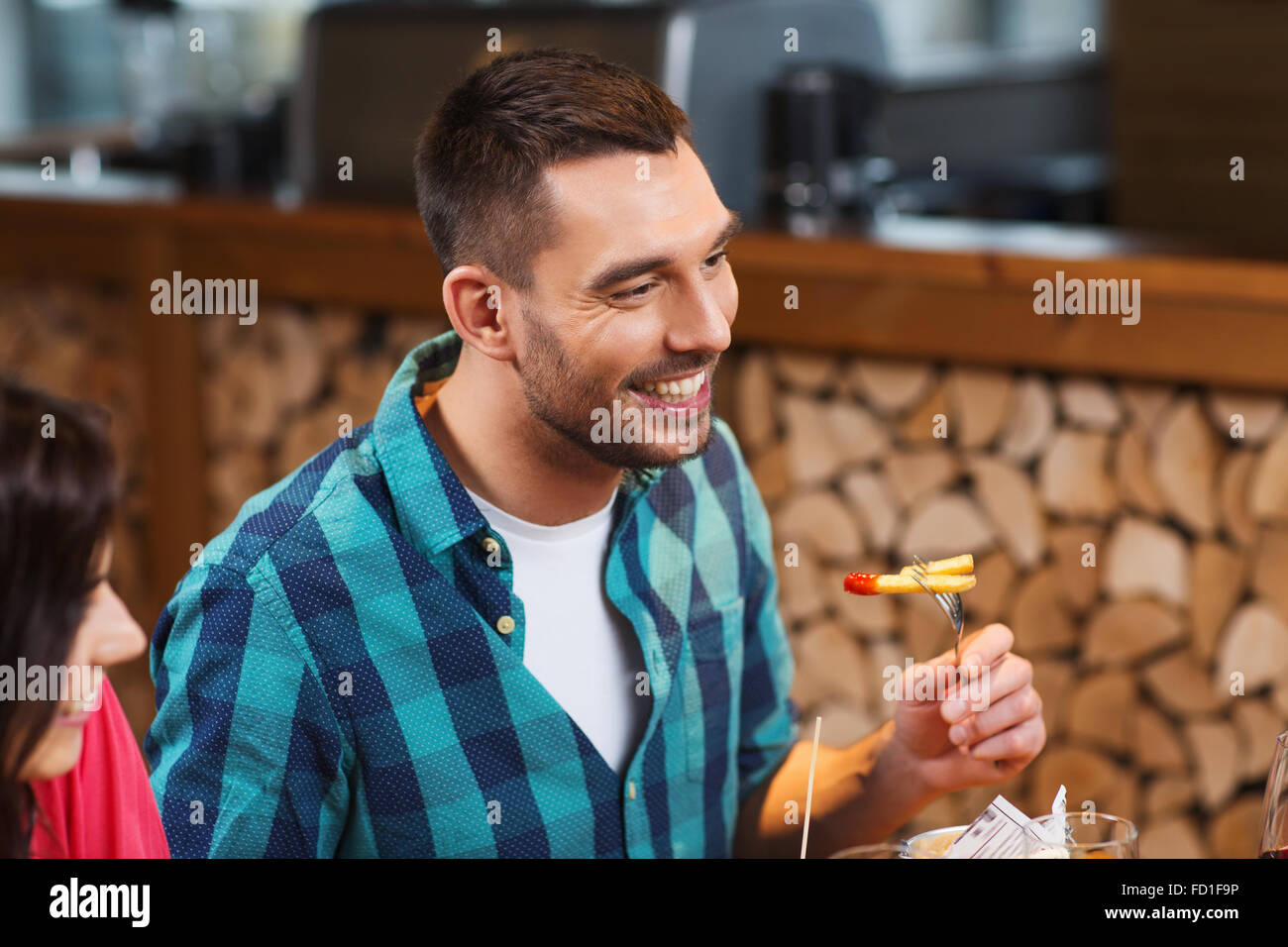 happy man having dinner at restaurant Stock Photo - Alamy