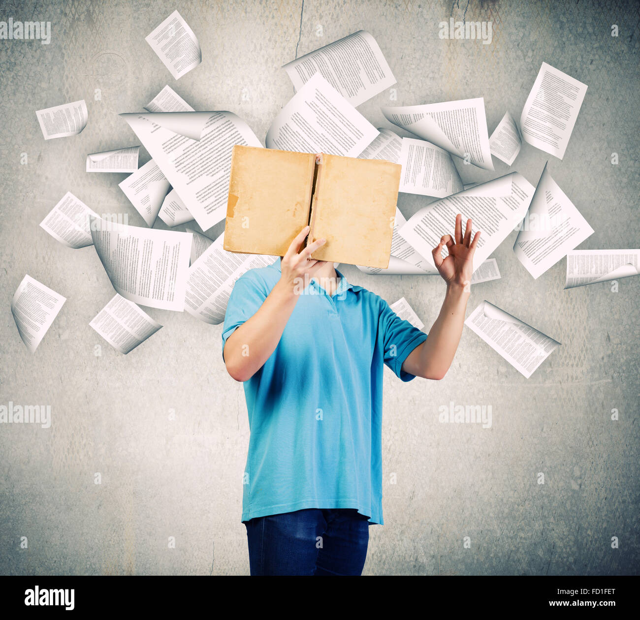 Young man with opened book. Reading and education Stock Photo - Alamy