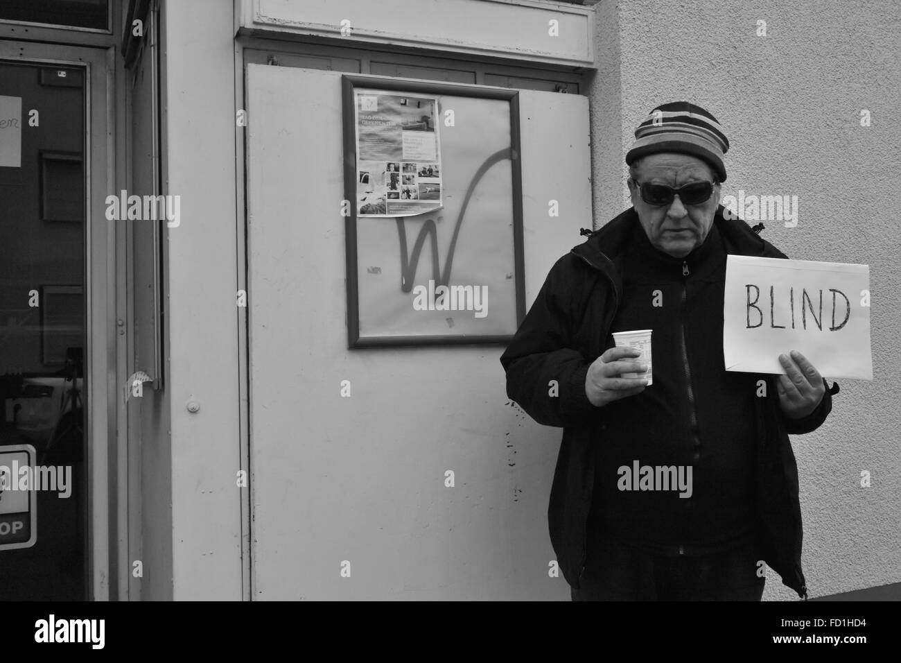 Blind beggar hi-res stock photography and images - Alamy