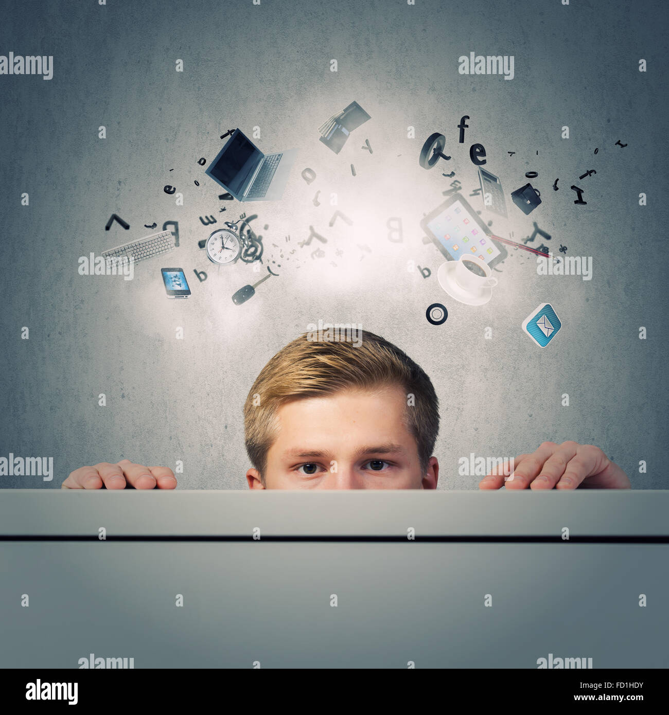 Half of face of businessman looking out from under the table Stock ...