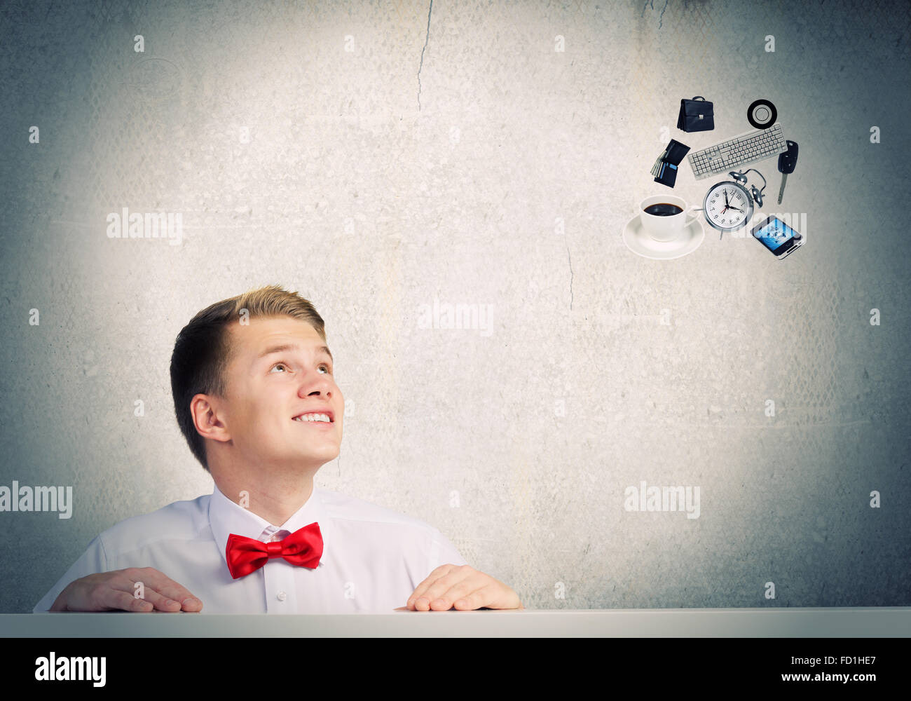 Half of face of businessman looking out from under the table Stock ...