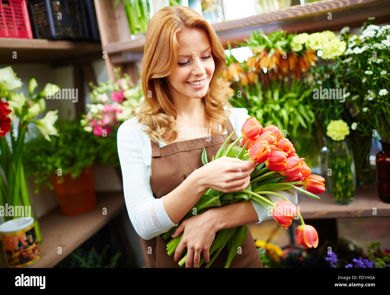 Happy florist hi-res stock photography and images - Alamy