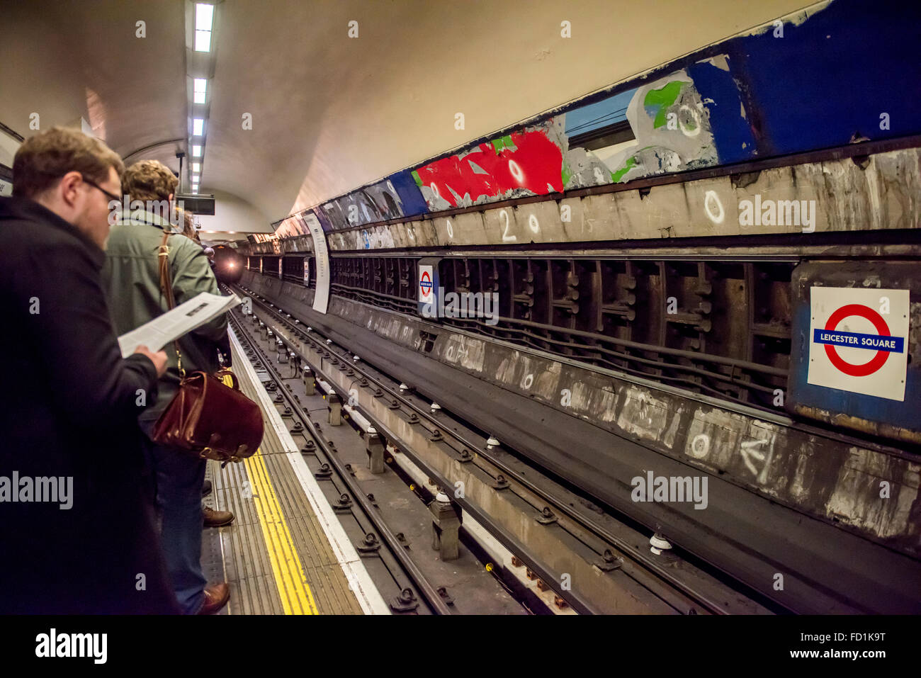 Leicester Square stn, Piccadilly line platform: train is approaching ...