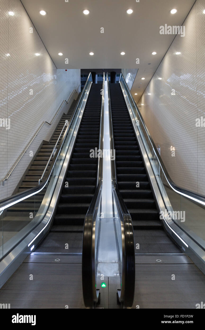 pedestrian escalator to Kings Cross underground station Stock Photo - Alamy