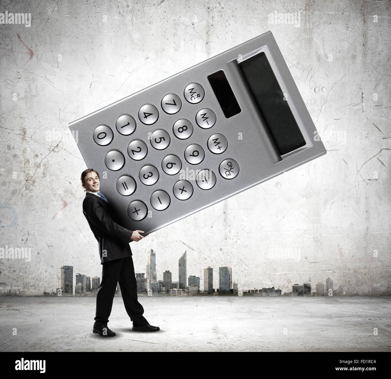 Young businessman carrying huge calculator in hands Stock Photo - Alamy