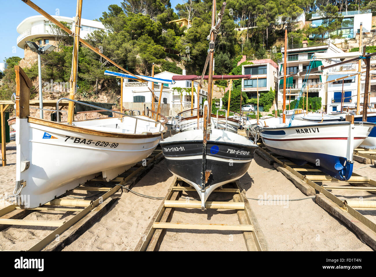 Typical fishing boats on the beach of Sa Riera in the Costa Brava ...