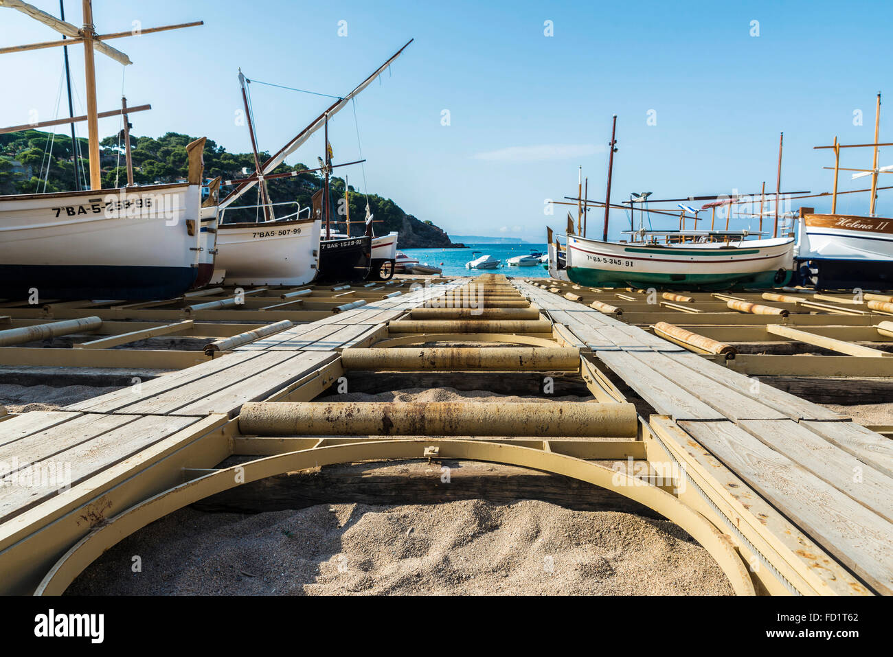 Typical fishing boats on the beach of Sa Riera in the Costa Brava ...