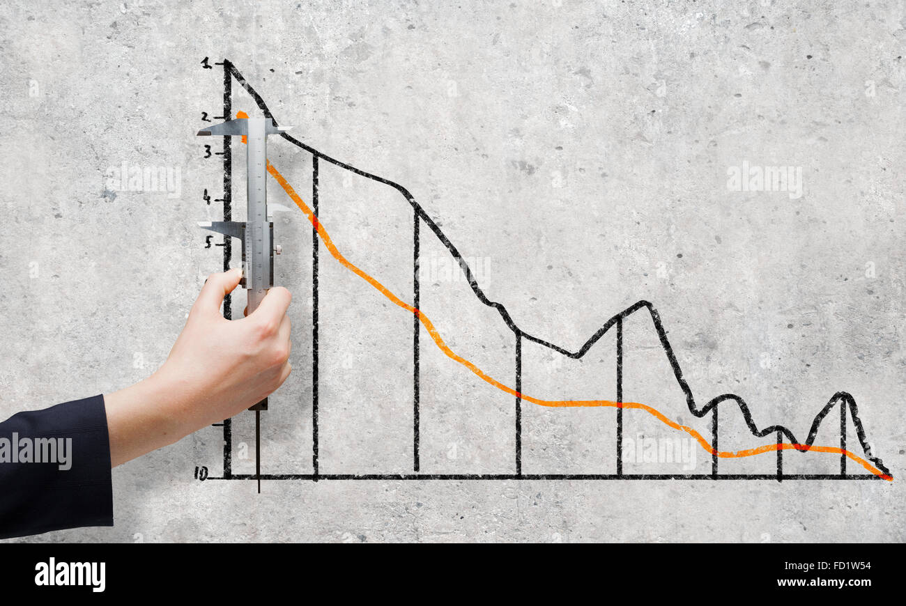 Close up of female hand measuring graph with ruler Stock Photo - Alamy