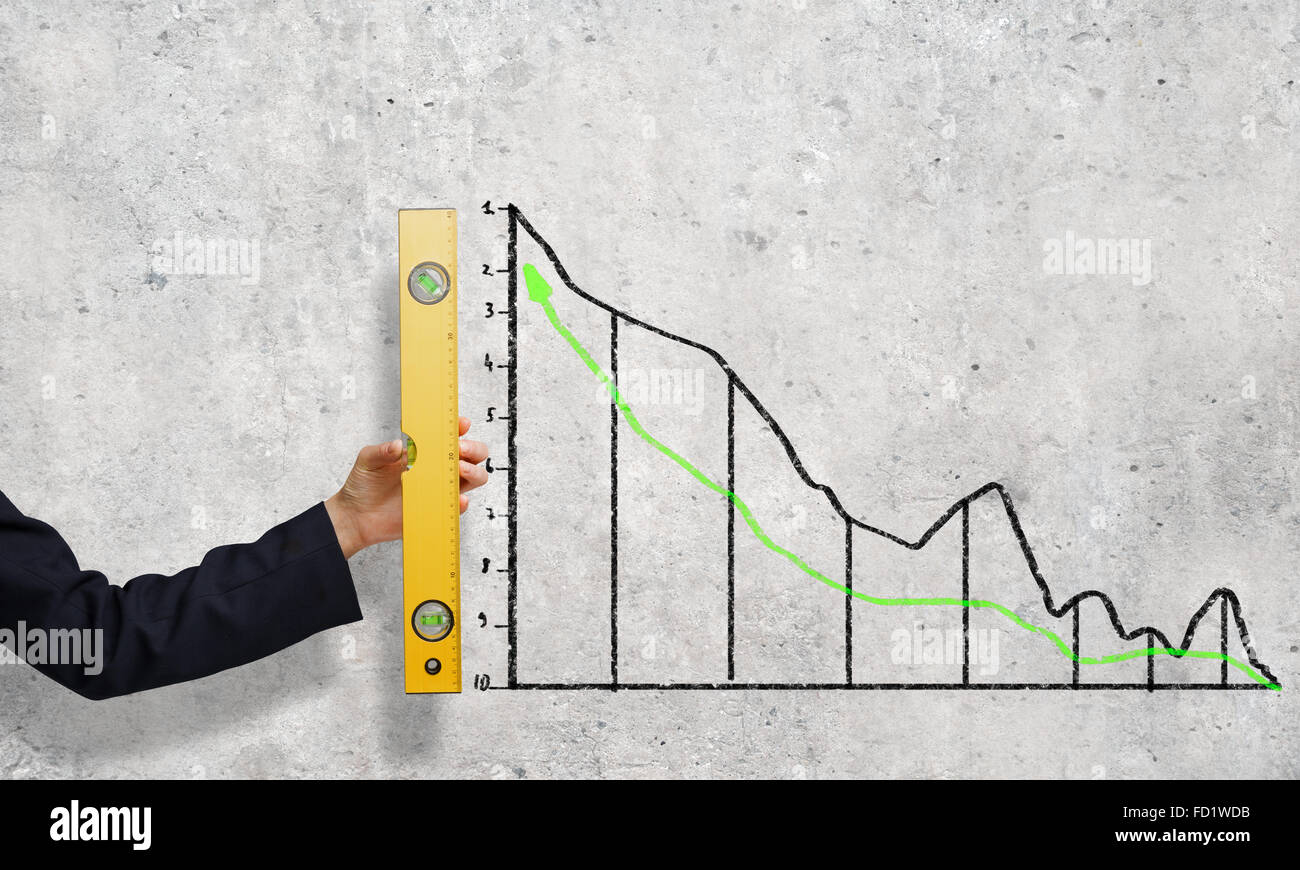 Close up of female hand measuring graph with ruler Stock Photo - Alamy