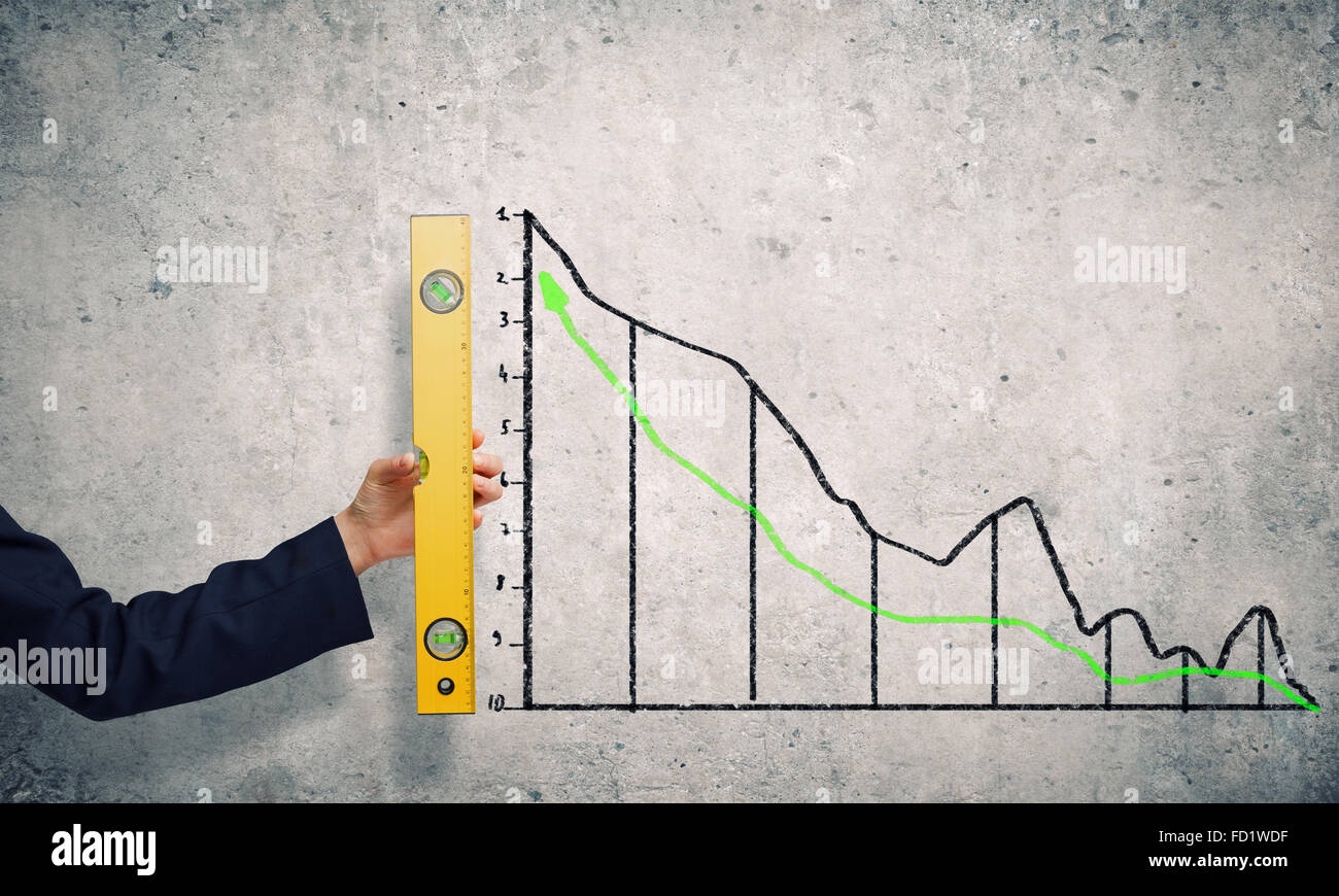 Close up of female hand measuring graph with ruler Stock Photo - Alamy