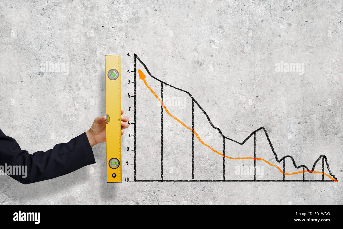 Close up of female hand measuring graph with ruler Stock Photo - Alamy