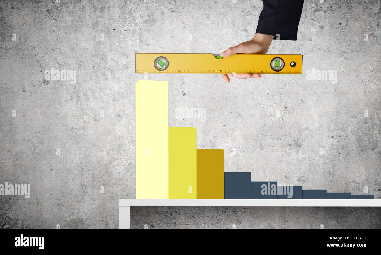 Close up of female hand measuring graph with ruler Stock Photo - Alamy