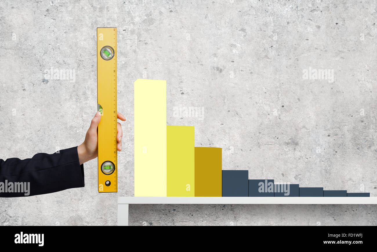 Close up of female hand measuring graph with ruler Stock Photo - Alamy