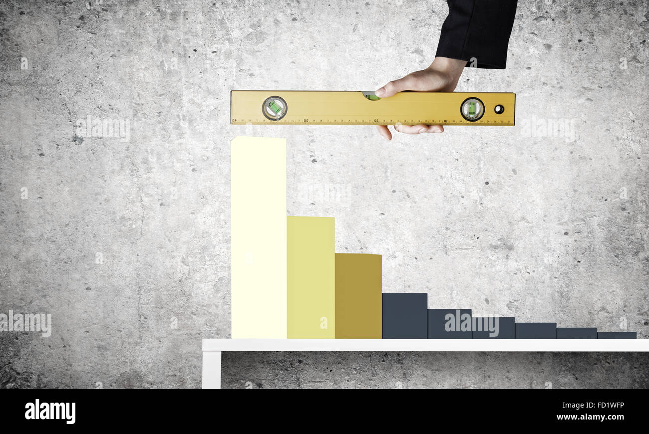 Close up of female hand measuring graph with ruler Stock Photo - Alamy