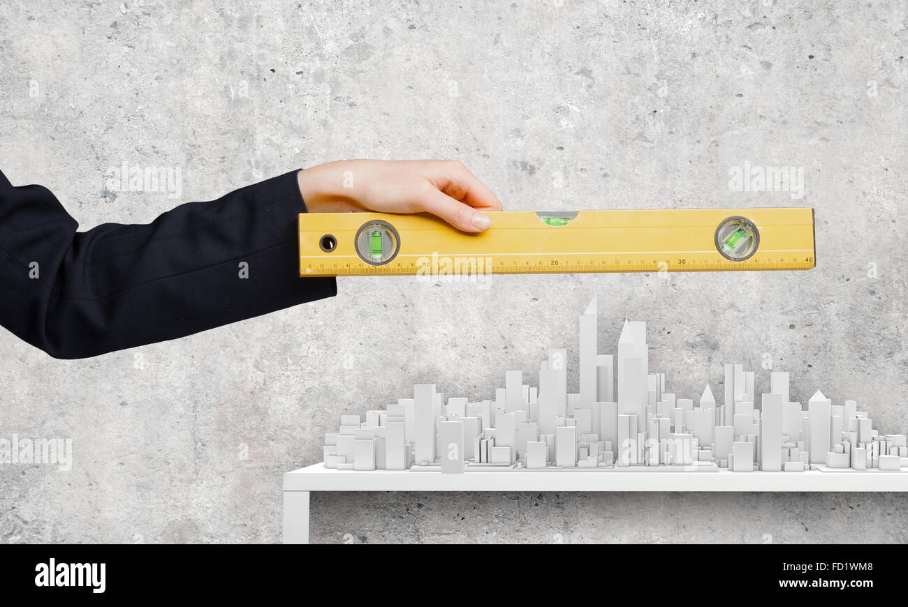 Close up of female hand measuring construction project with ruler Stock ...