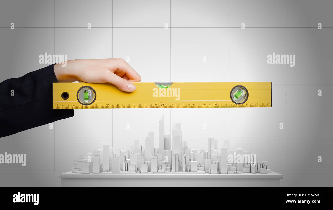 Close up of female hand measuring construction project with ruler Stock ...