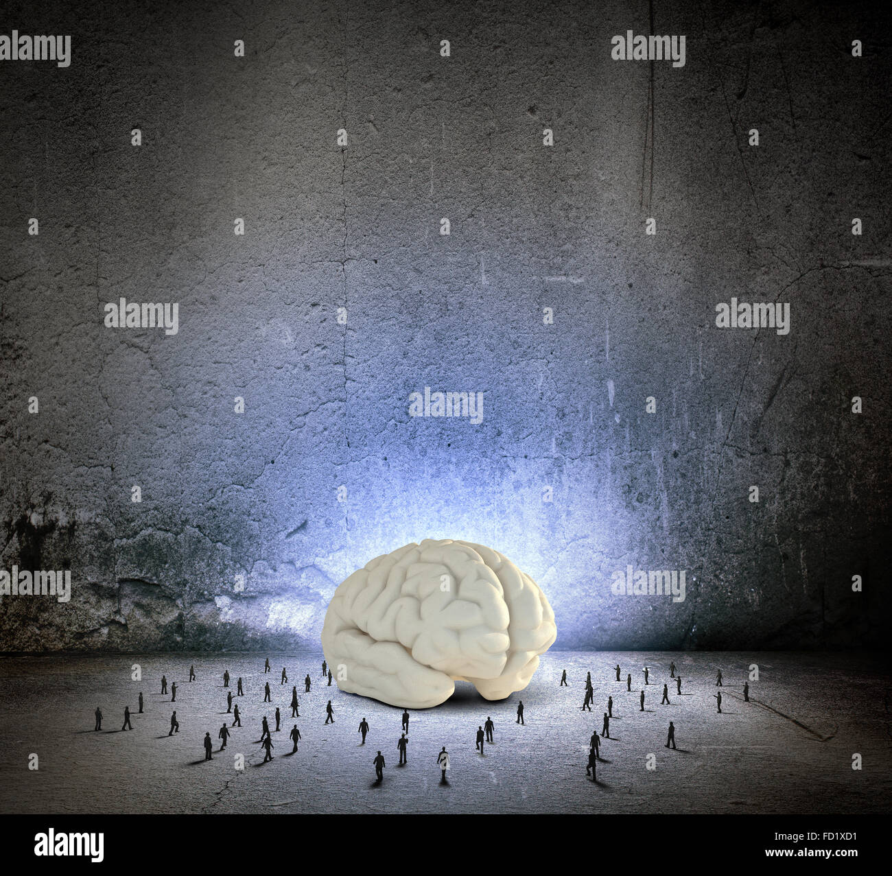 Huge human brain and many little businesspeople around Stock Photo - Alamy